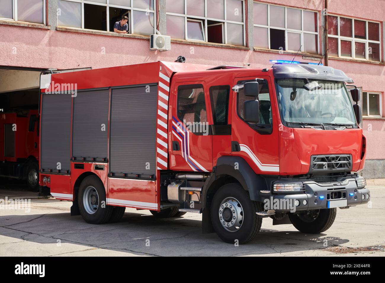 A state-of-the-art firetruck, equipped with advanced rescue technology ...