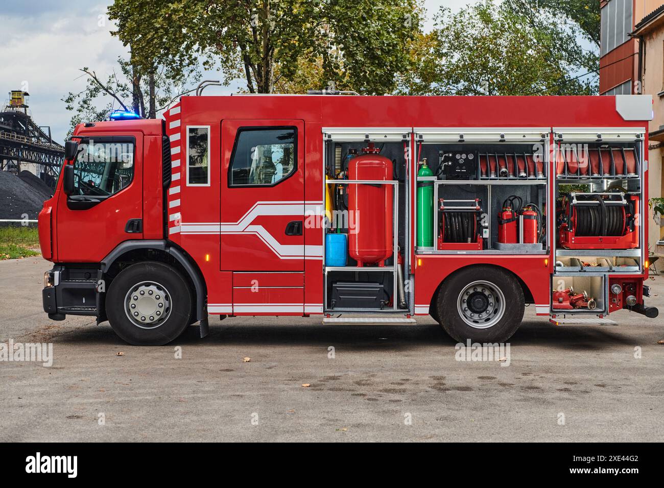 A state-of-the-art firetruck, equipped with advanced rescue technology ...
