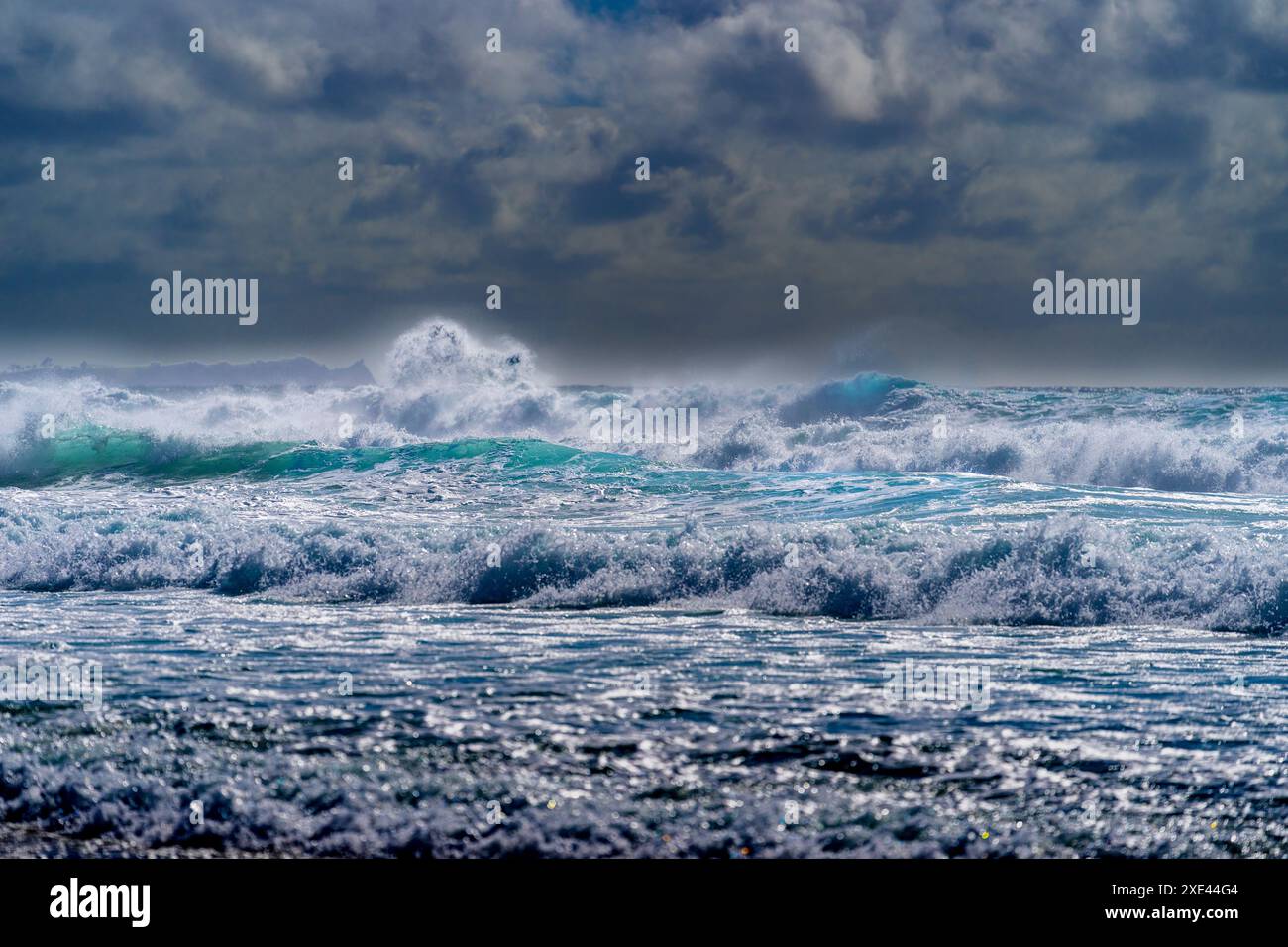 Heavy seas and stormy clouds on ocean beach at Whangarei Heads Stock ...