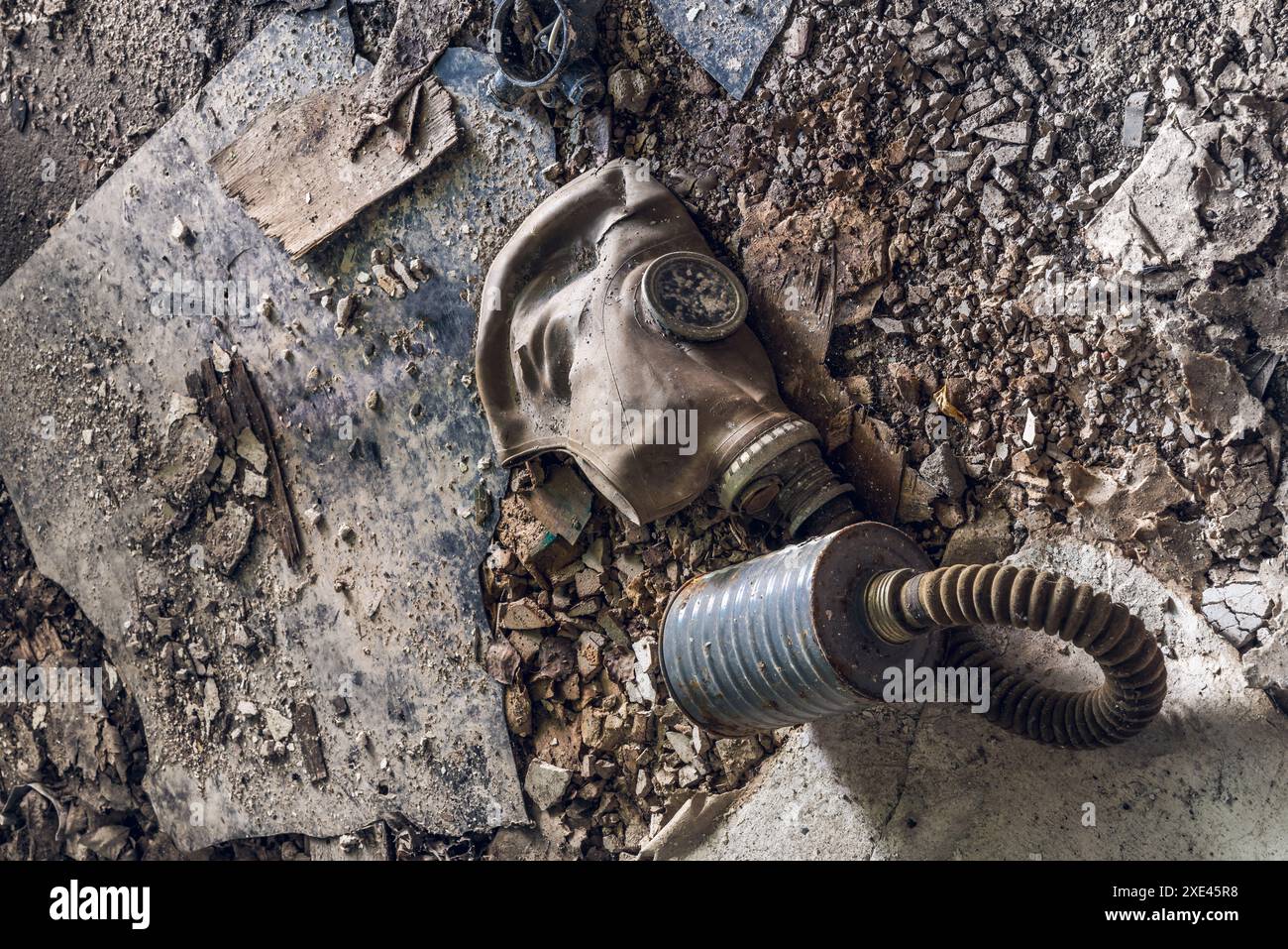 Old Dirty Gas Mask Lying On Messy Industrial Ground Stock Photo - Alamy