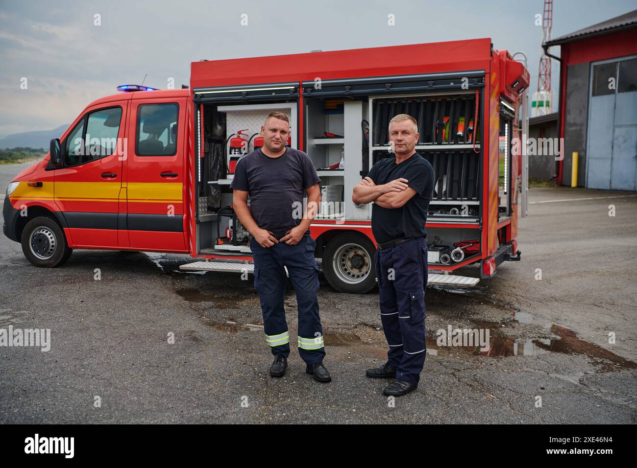 A skilled and dedicated professional firefighting team proudly poses in ...
