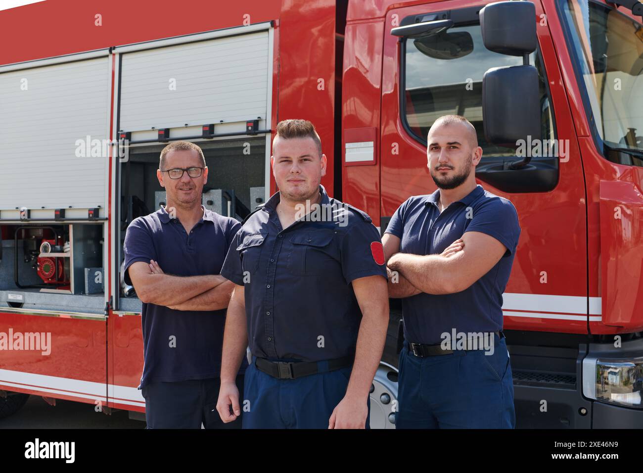 A skilled and dedicated professional firefighting team proudly poses in ...
