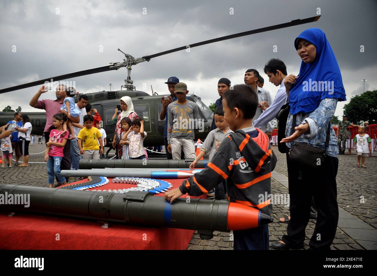 Jakarta, Indonesia - December 13, 2014 : Jakarta residents are looking ...