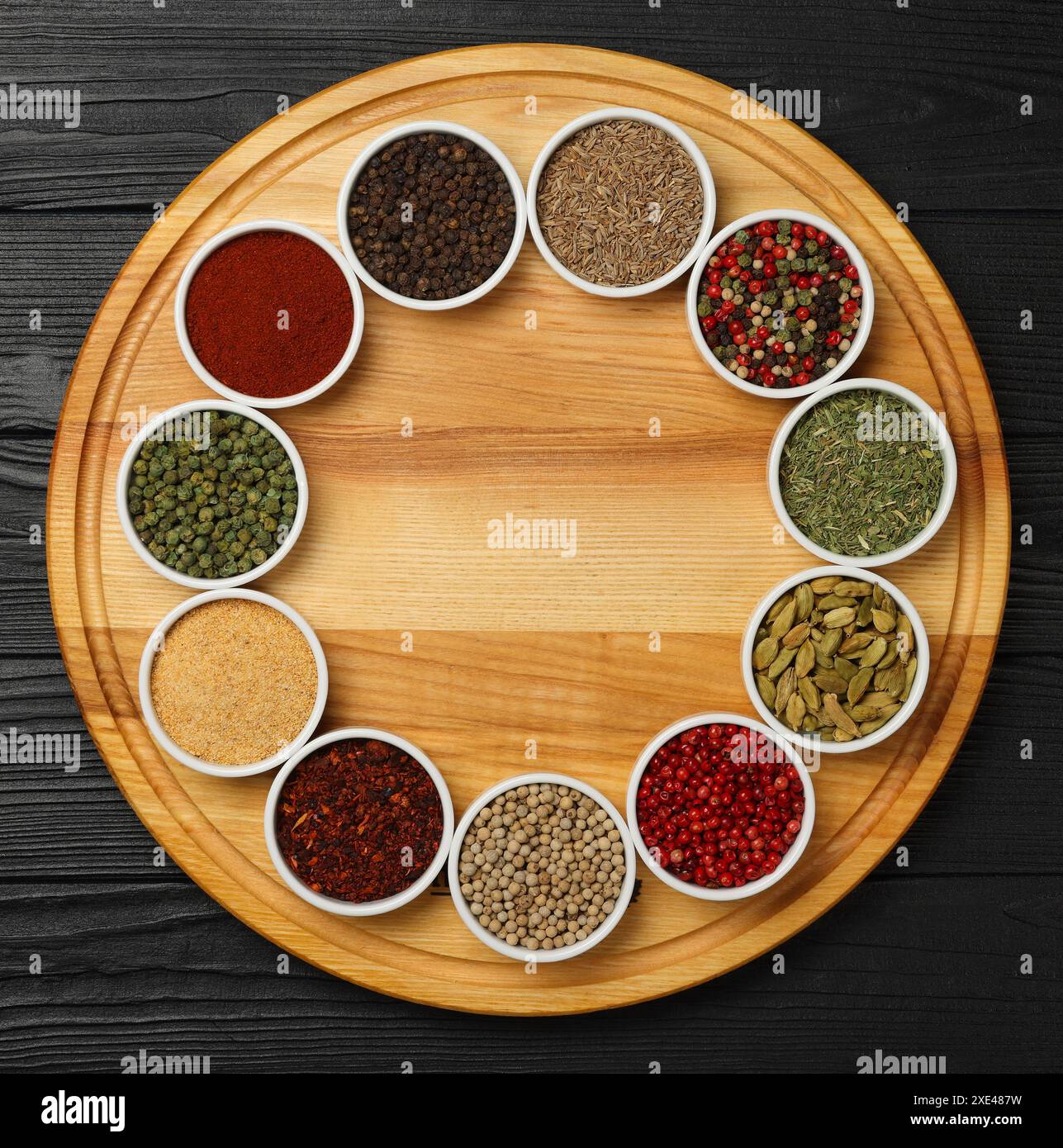 Circle of assorted spices in bowls Stock Photo - Alamy