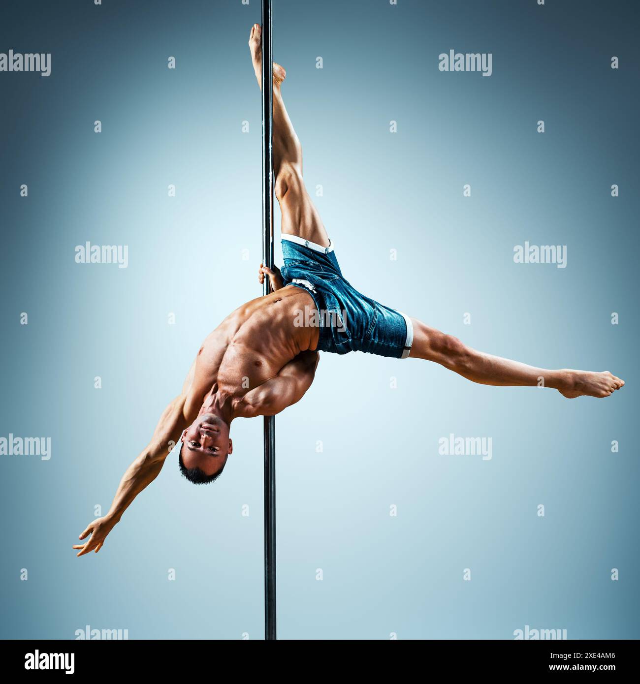Man pole dancing Stock Photo - Alamy