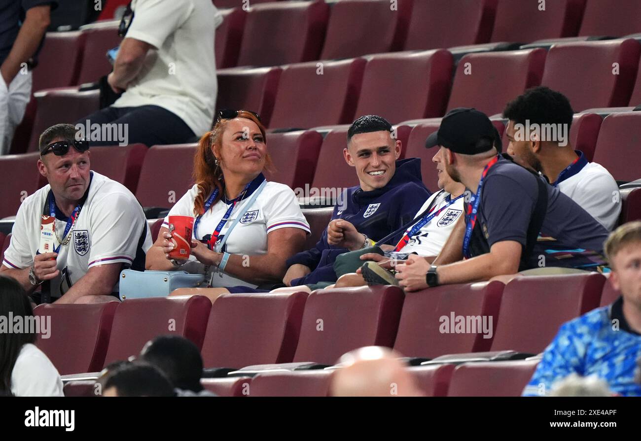 England's Phil Foden with family following the UEFA Euro 2024 Group C ...
