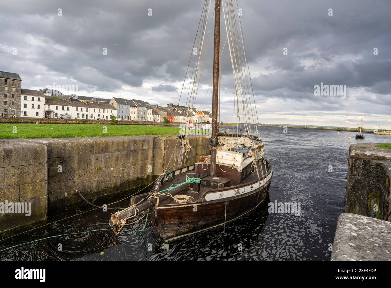 Boat anchored in Eglinton Canal Sea Lock Stock Photo - Alamy