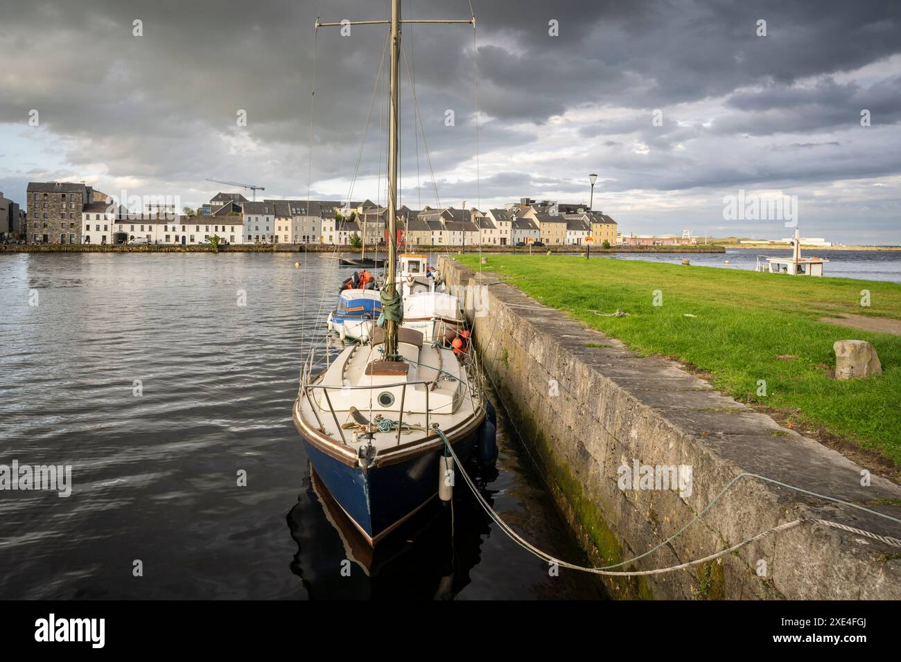 Boat anchored in Eglinton Canal Sea Lock Stock Photo - Alamy