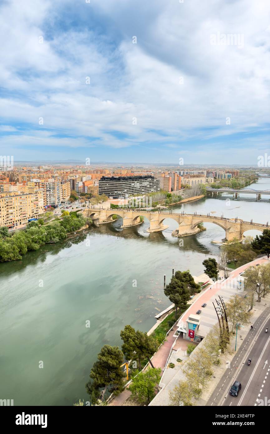 Aerial view of Zaragoza cityscape and stone bridge over Ebro river from Pilar Basilica tower ...