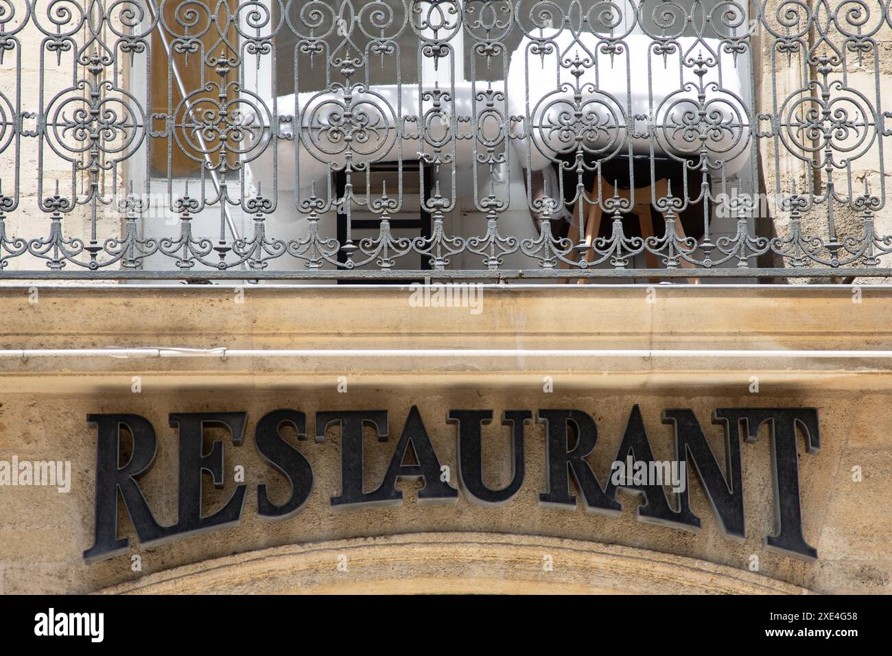 Old text restaurant sign on entrance facade wall signage Stock Photo - Alamy