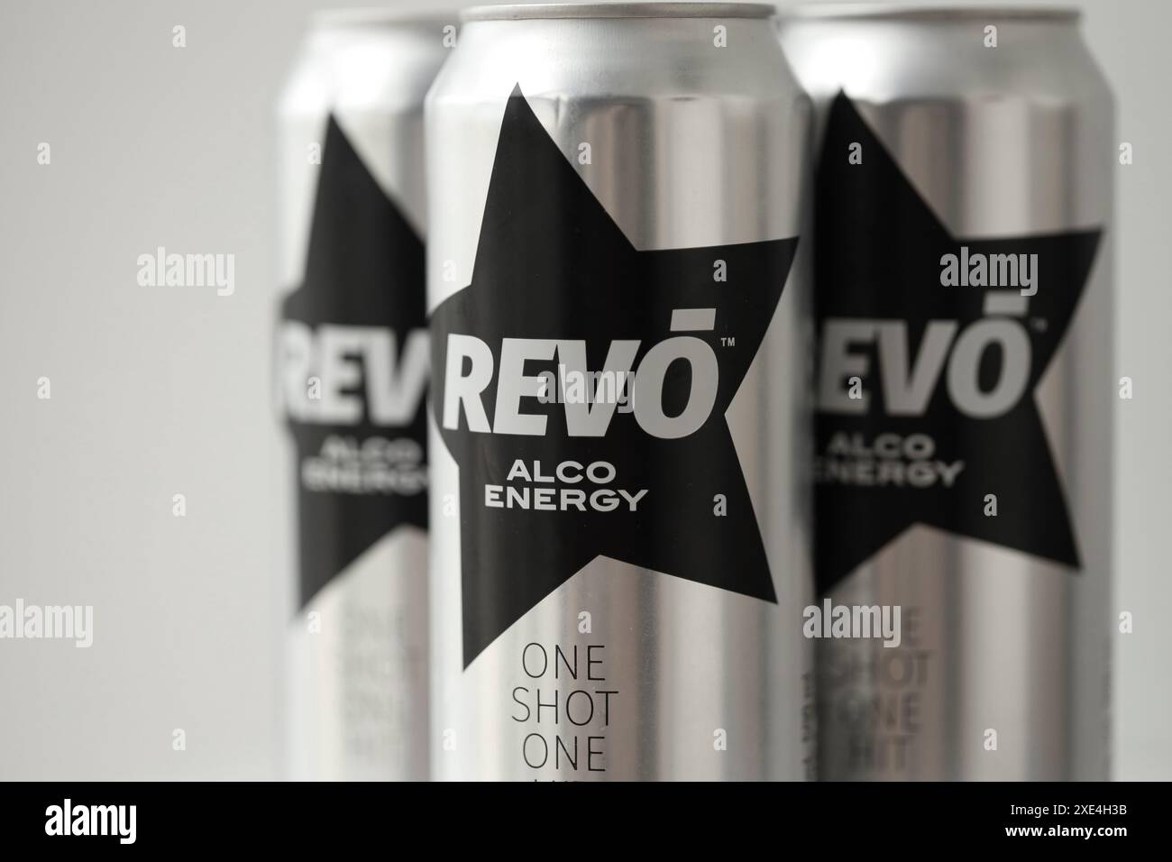 KYIV, UKRAINE - APRIL 20, 2024 Cans of Revo alco energy drink in new ...