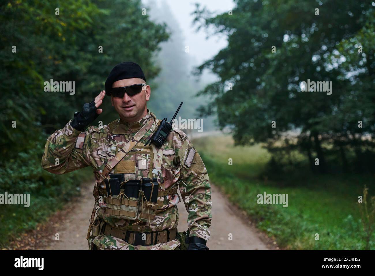A dedicated soldier salutes his elite unit, showcasing camaraderie and ...