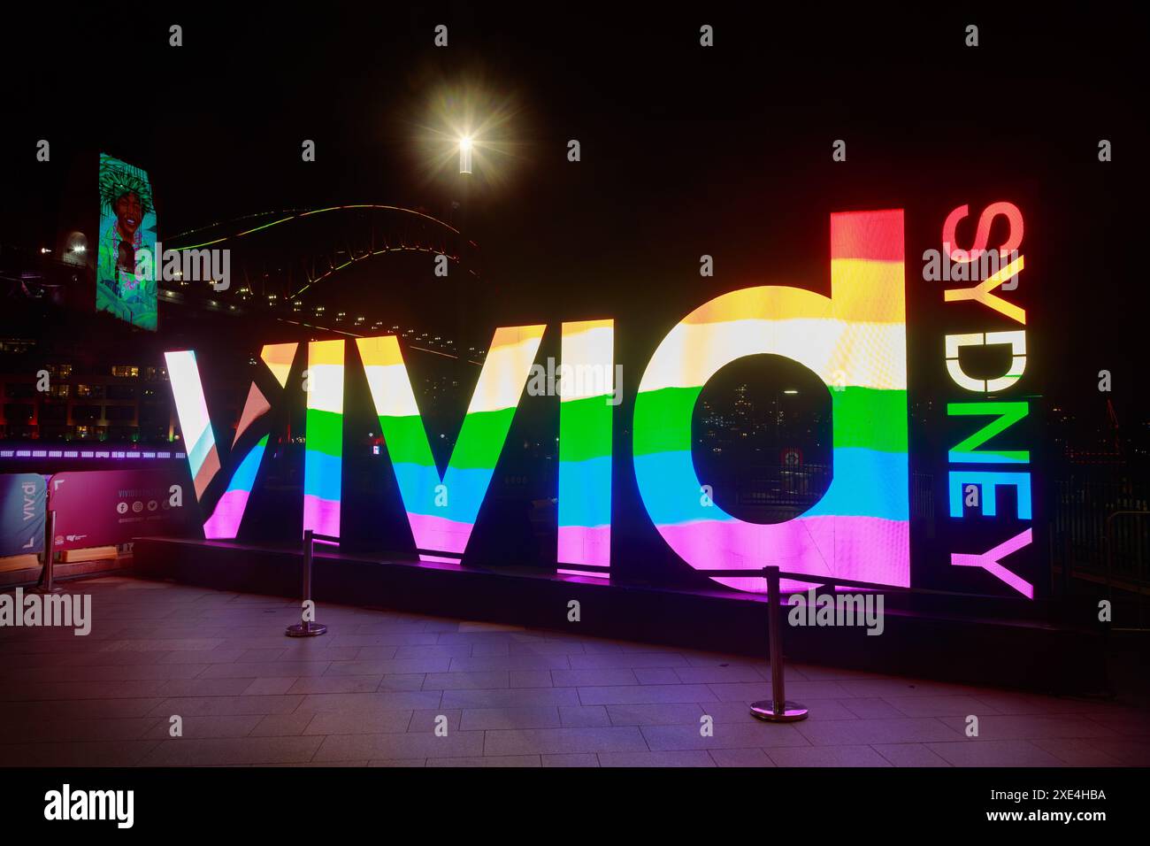 A rainbow pride flag displayed on an illuminated sign during the annual ...