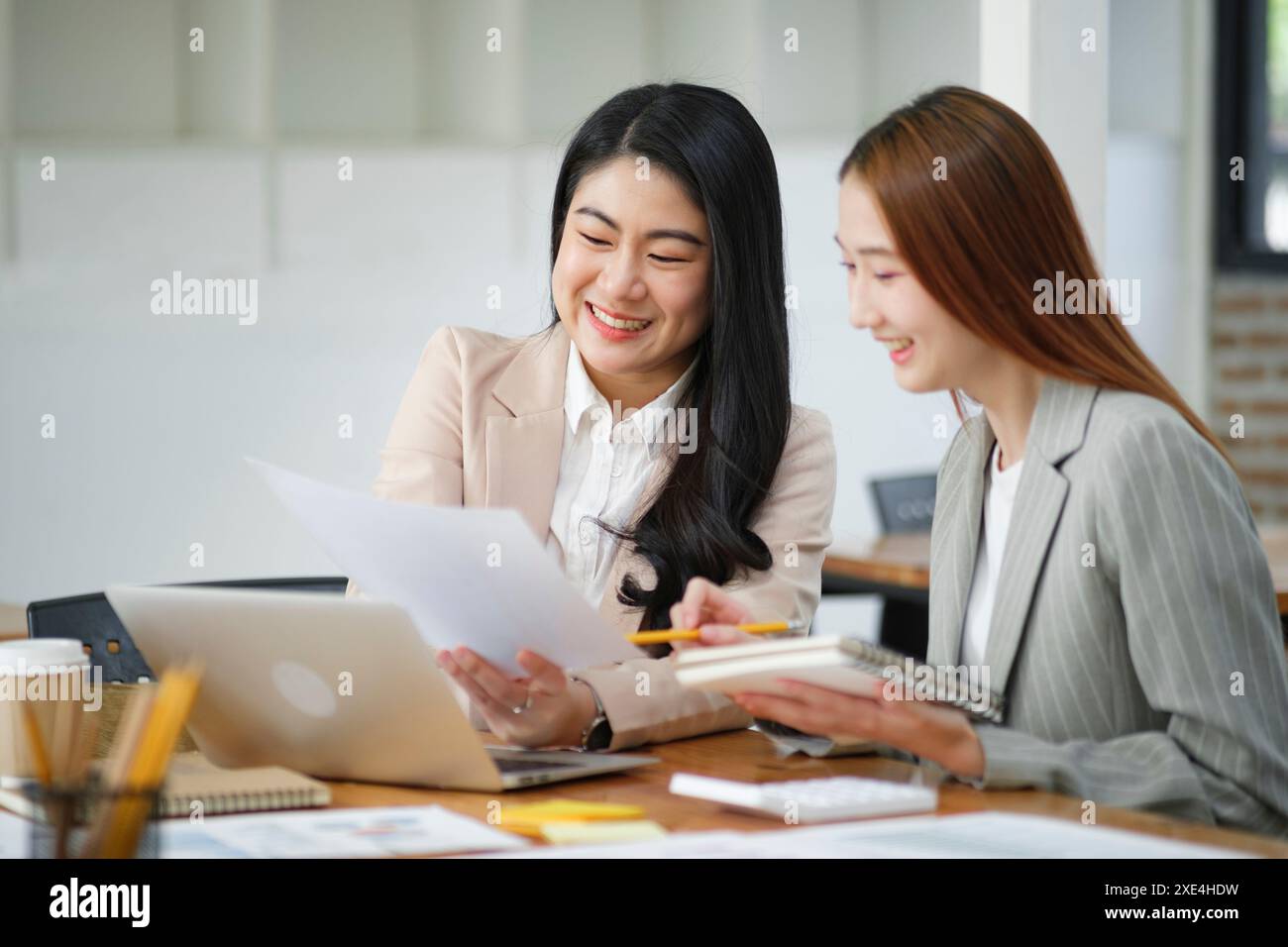 Working women are discussing work and planning new business plans ...