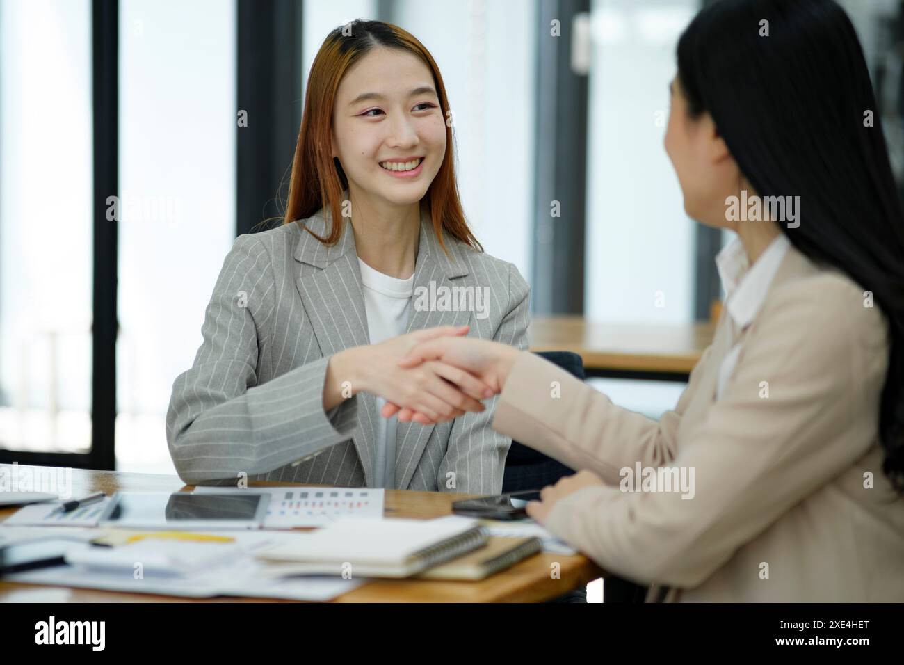 Accepting a business proposal with a handshake Stock Photo - Alamy