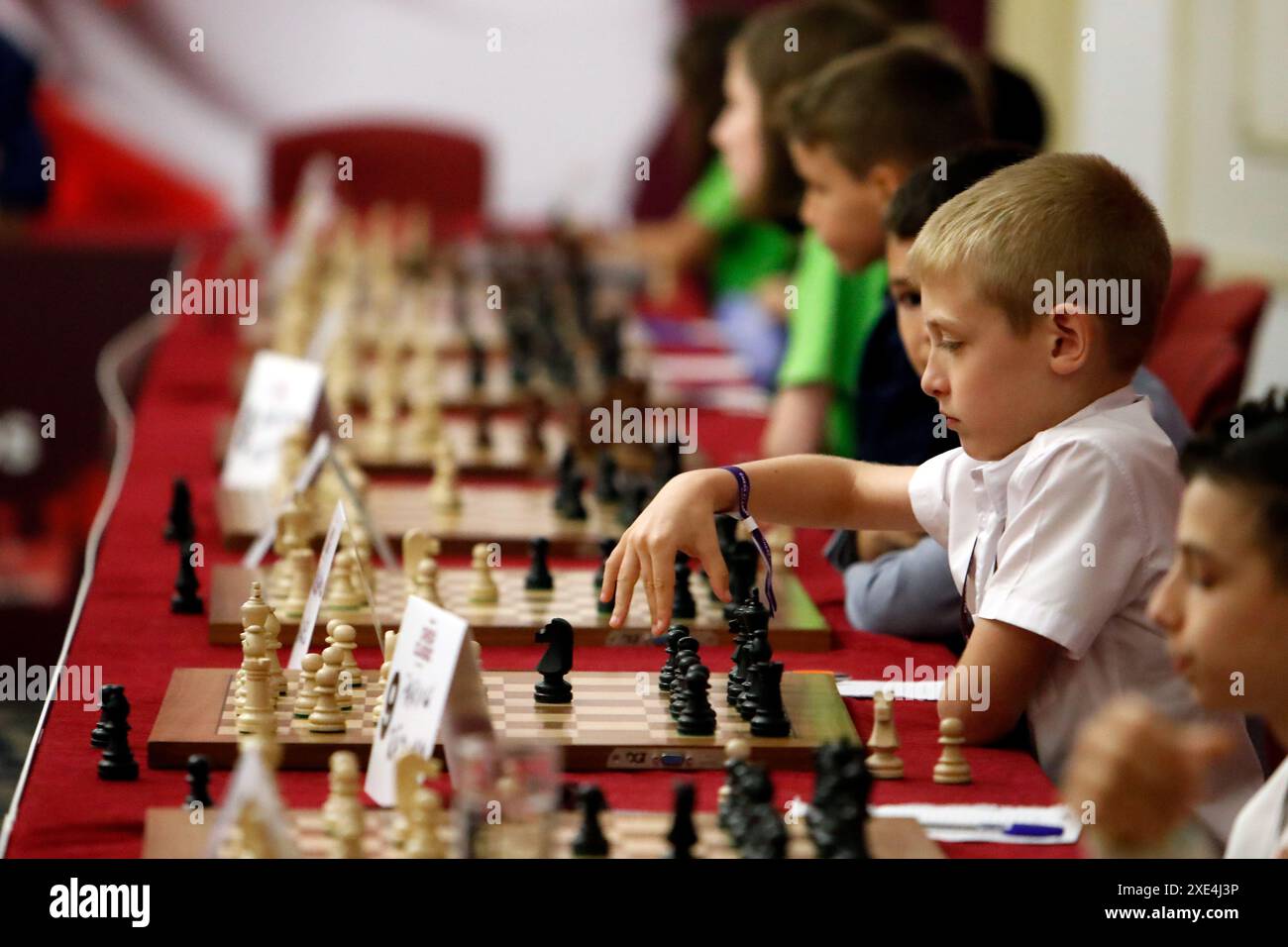 Bucharest, Romania. 25th June, 2024. A Romanian teenager player makes a ...