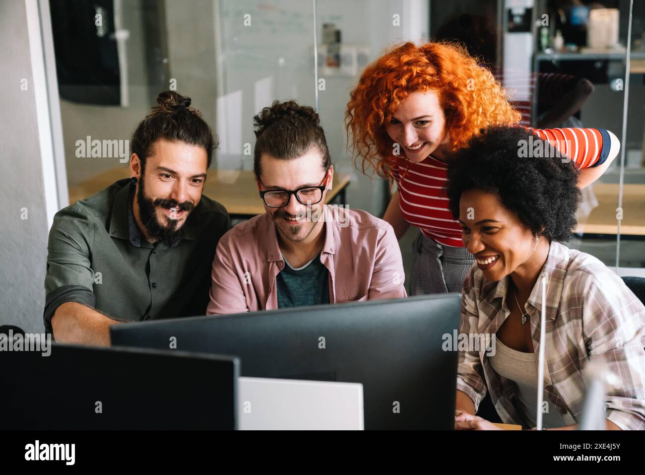Software engineers working on project and programming in company ...