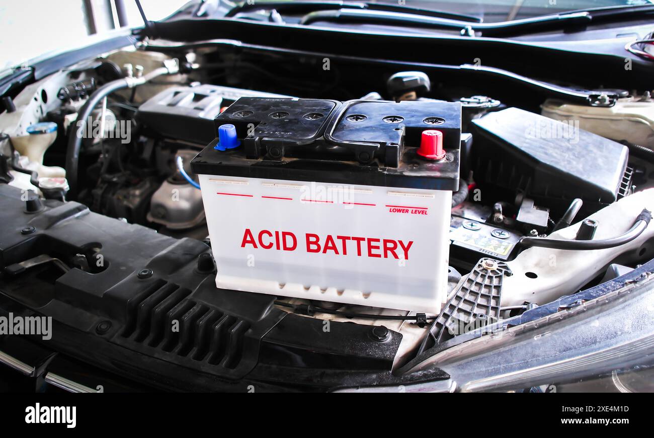 ACID Battery for car on the engine compartment of a car , Car battery ...