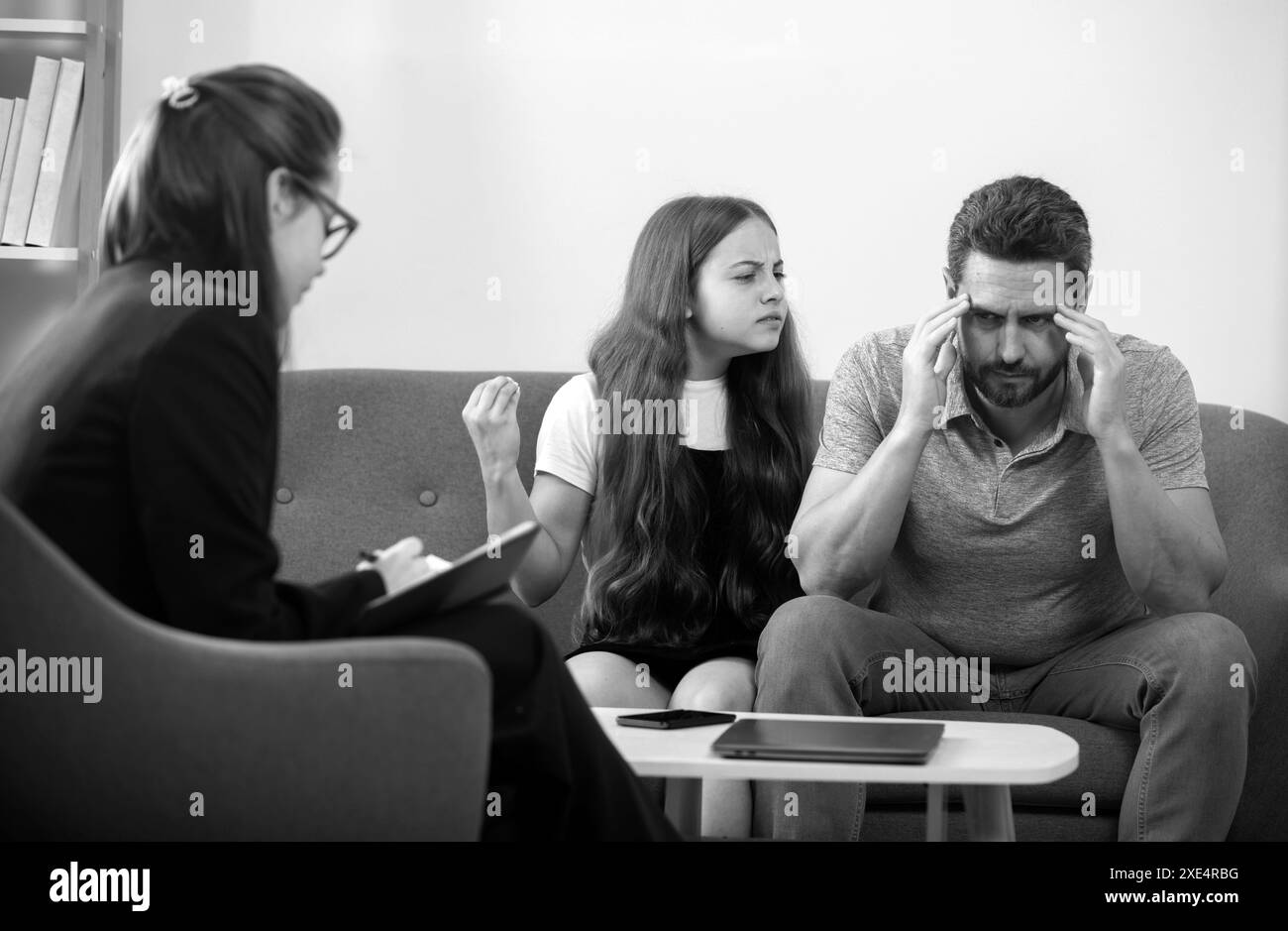 Bad parents. Psychology, mental family therapy, psychologist with father and daughter at ...