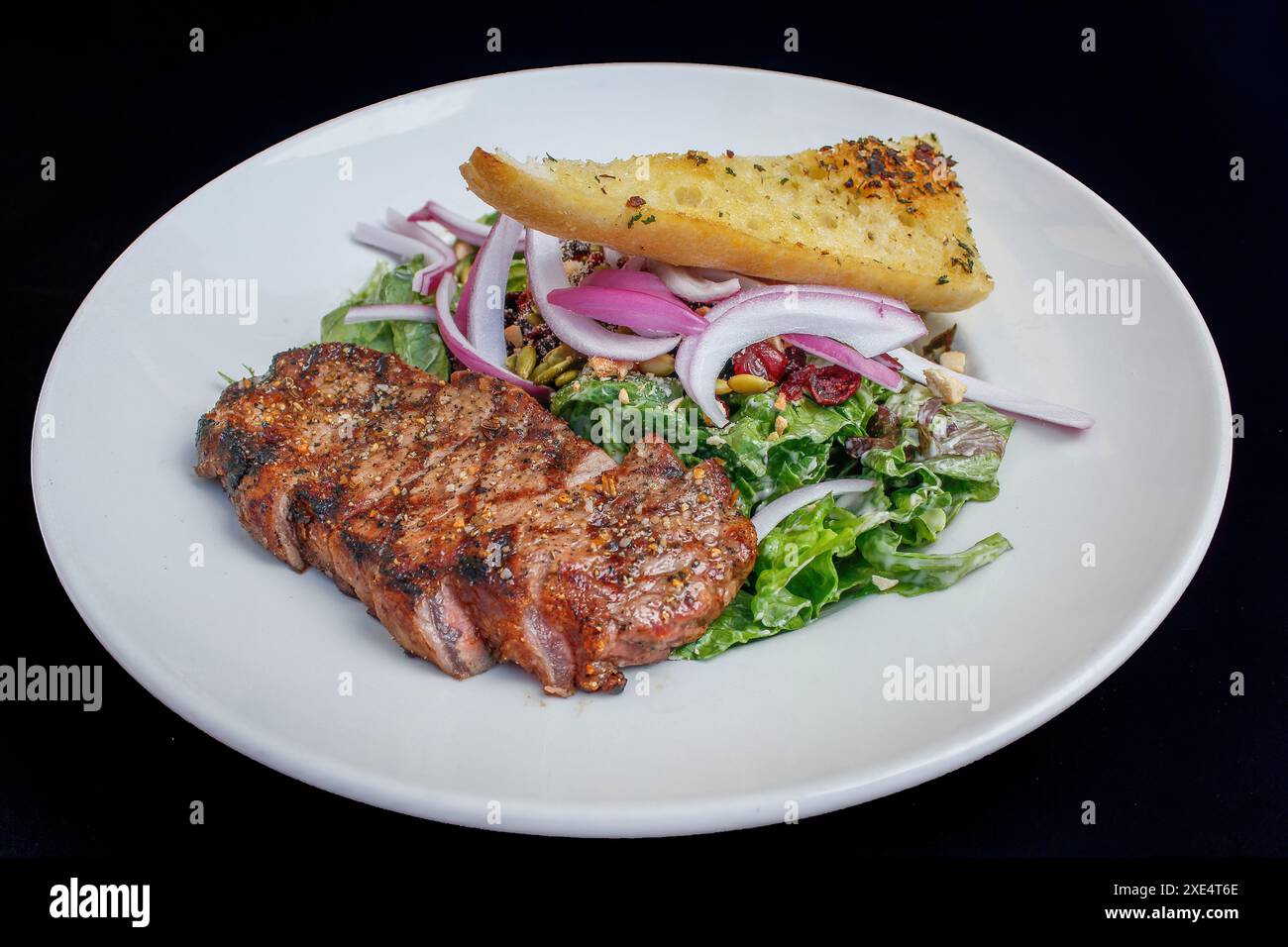 NY Strip steak with brown butter, accompanied by sautÃ©ed vegetables ...