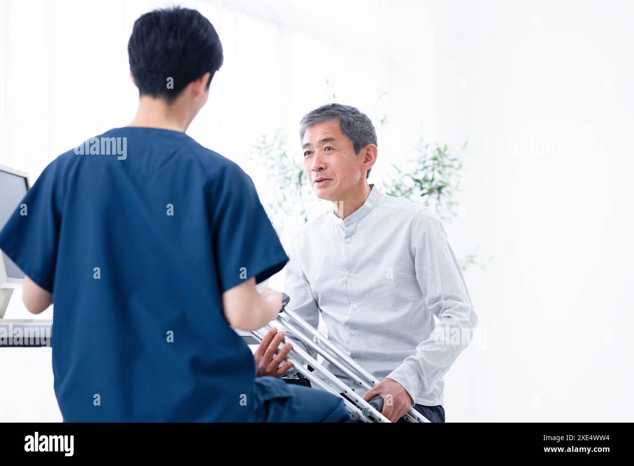 Patient and doctor interviewing in the examination room Stock Photo - Alamy