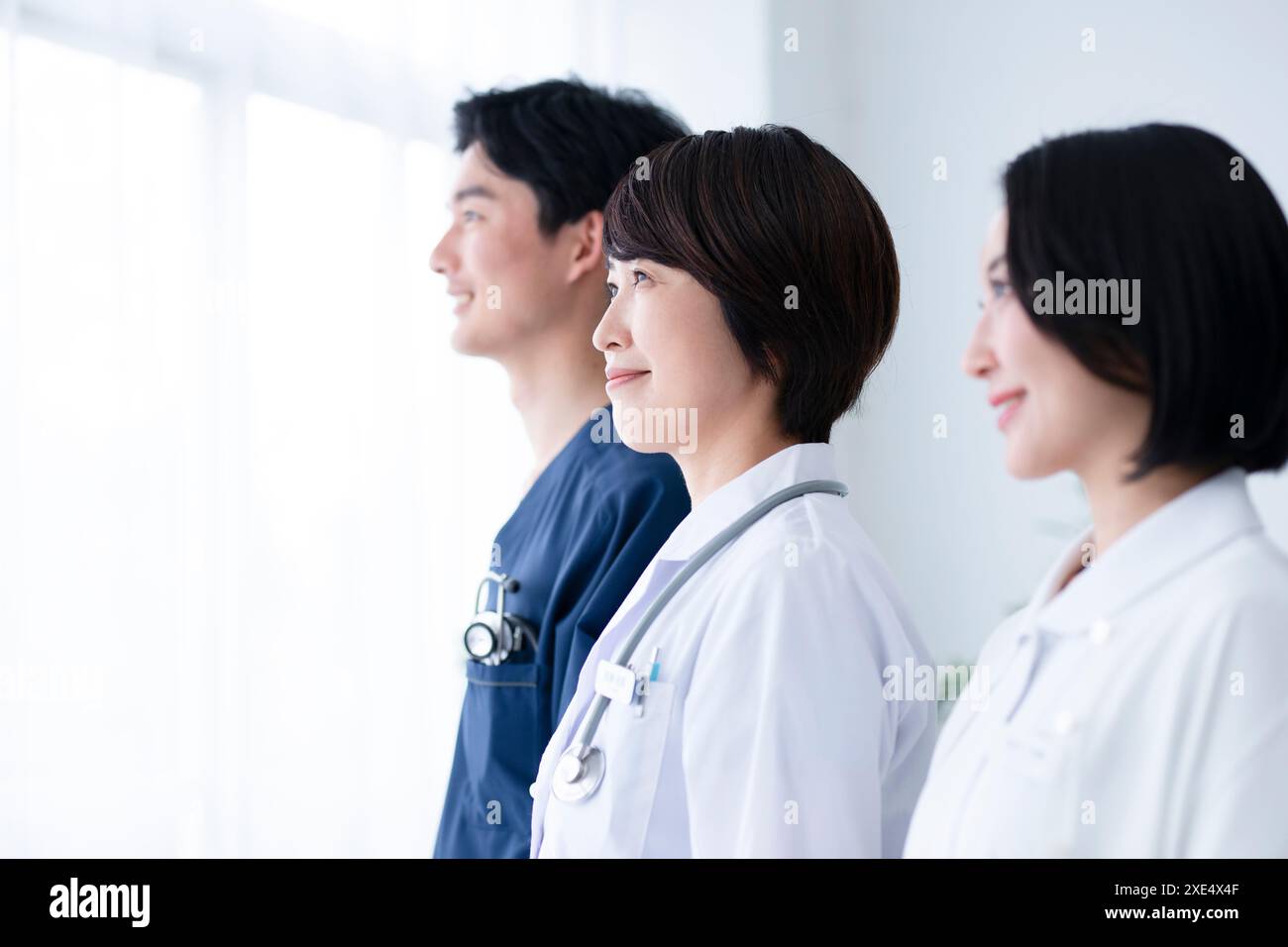 Doctors staring into the distance Stock Photo - Alamy