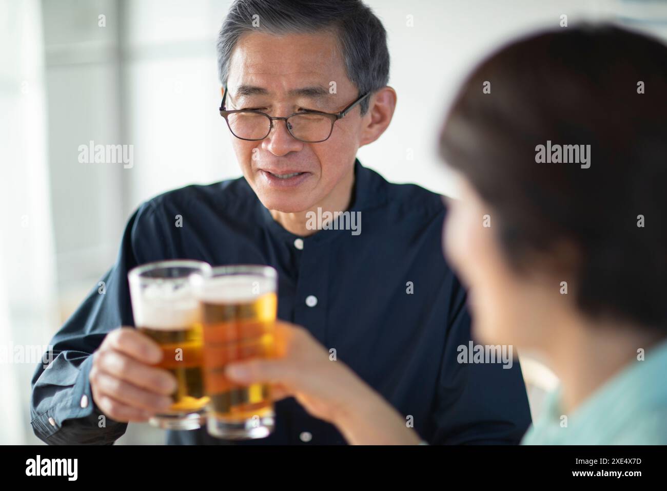 Couple making toast glasses hi-res stock photography and images - Alamy