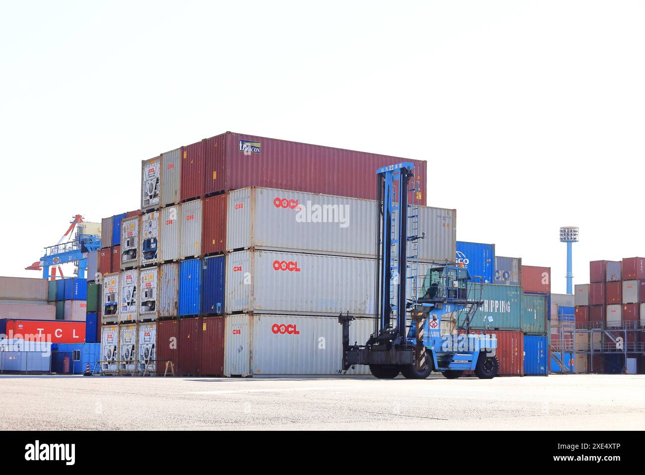 Containers and forklift trucks at Honmoku Wharf, Yokohama Stock Photo ...