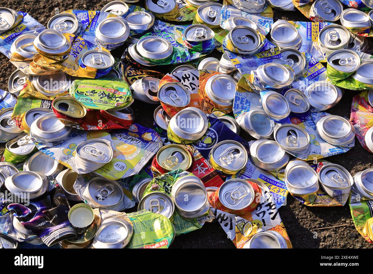 Crushed empty cans Stock Photo - Alamy