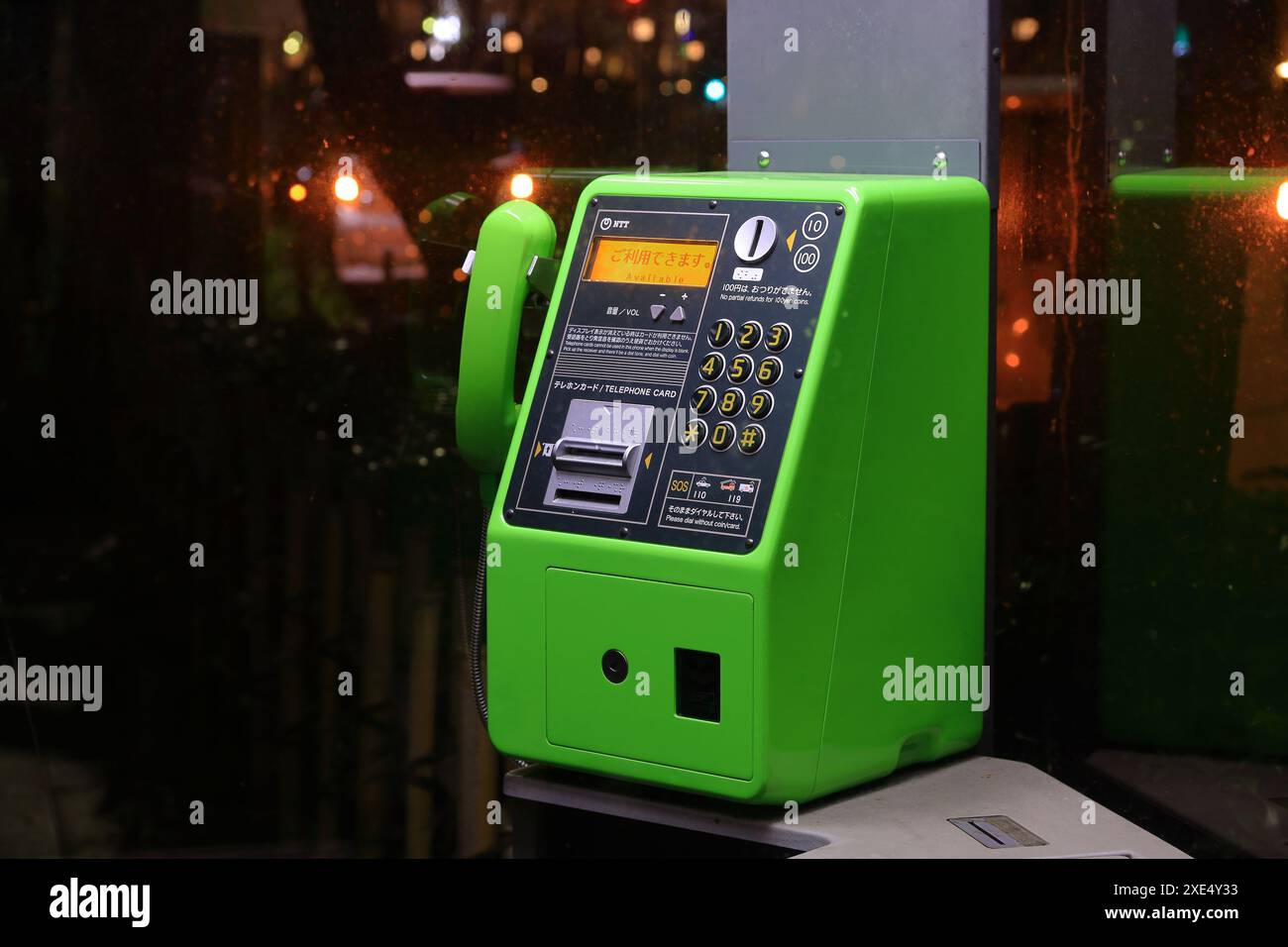 Coin operated public phone box hi-res stock photography and images - Alamy