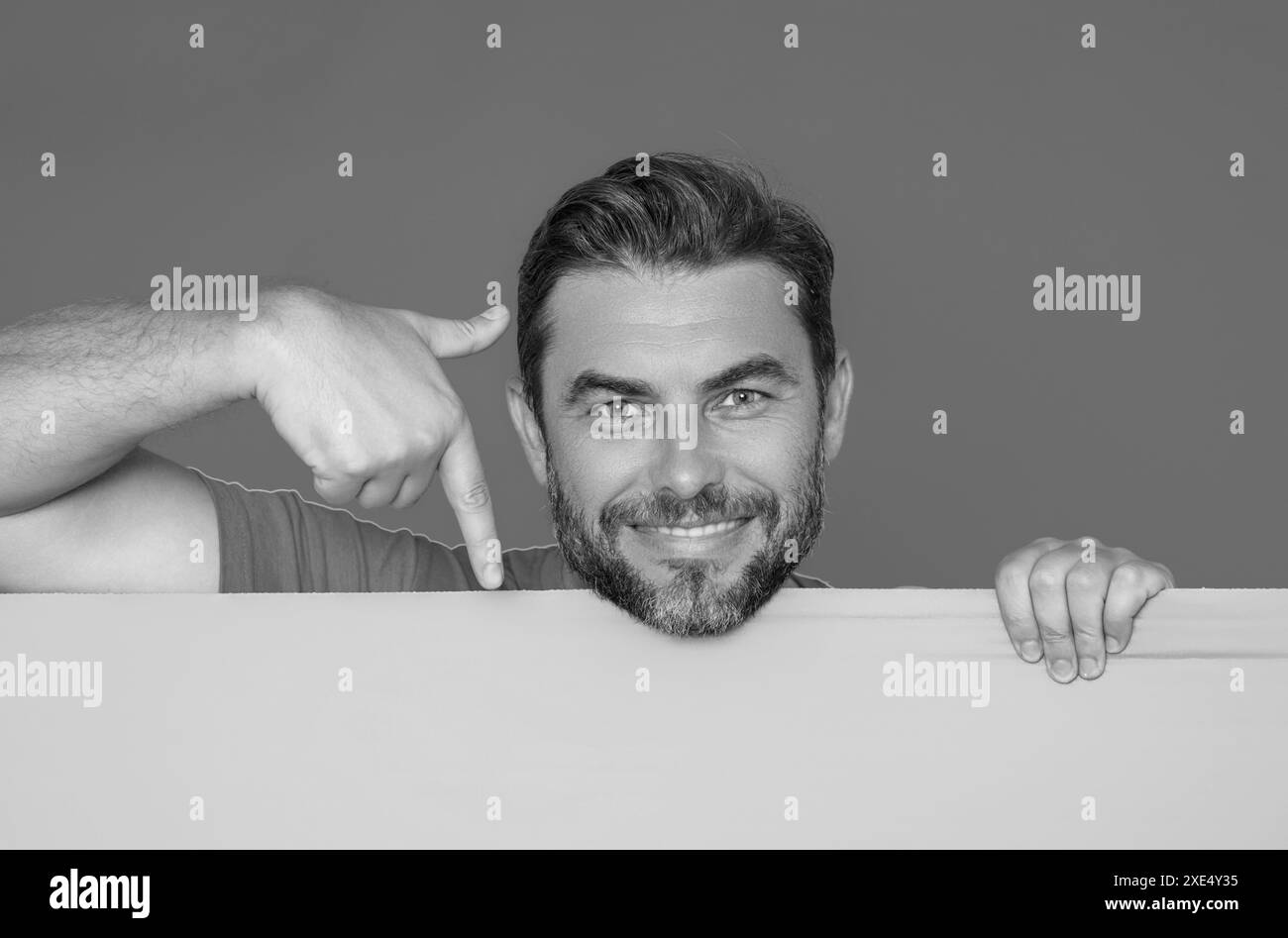 Man holds sign, blank card. Placard ready for your product. Sign to ...