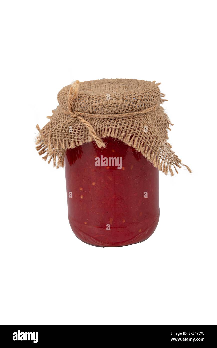 Homemade pepper and tomato paste in a jar. Tomato paste in a jar ...