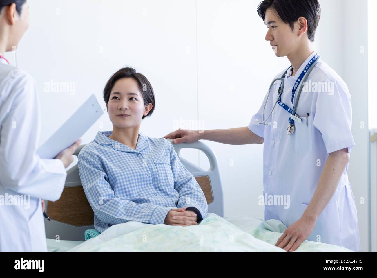Patient listening to doctor Stock Photo - Alamy