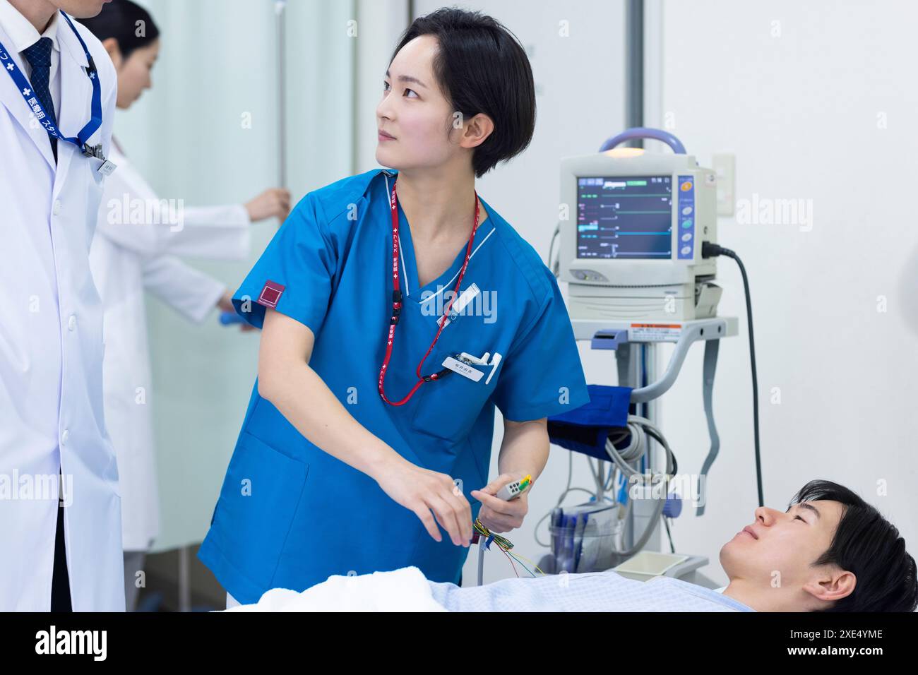 Nurse taking an ECG Stock Photo - Alamy