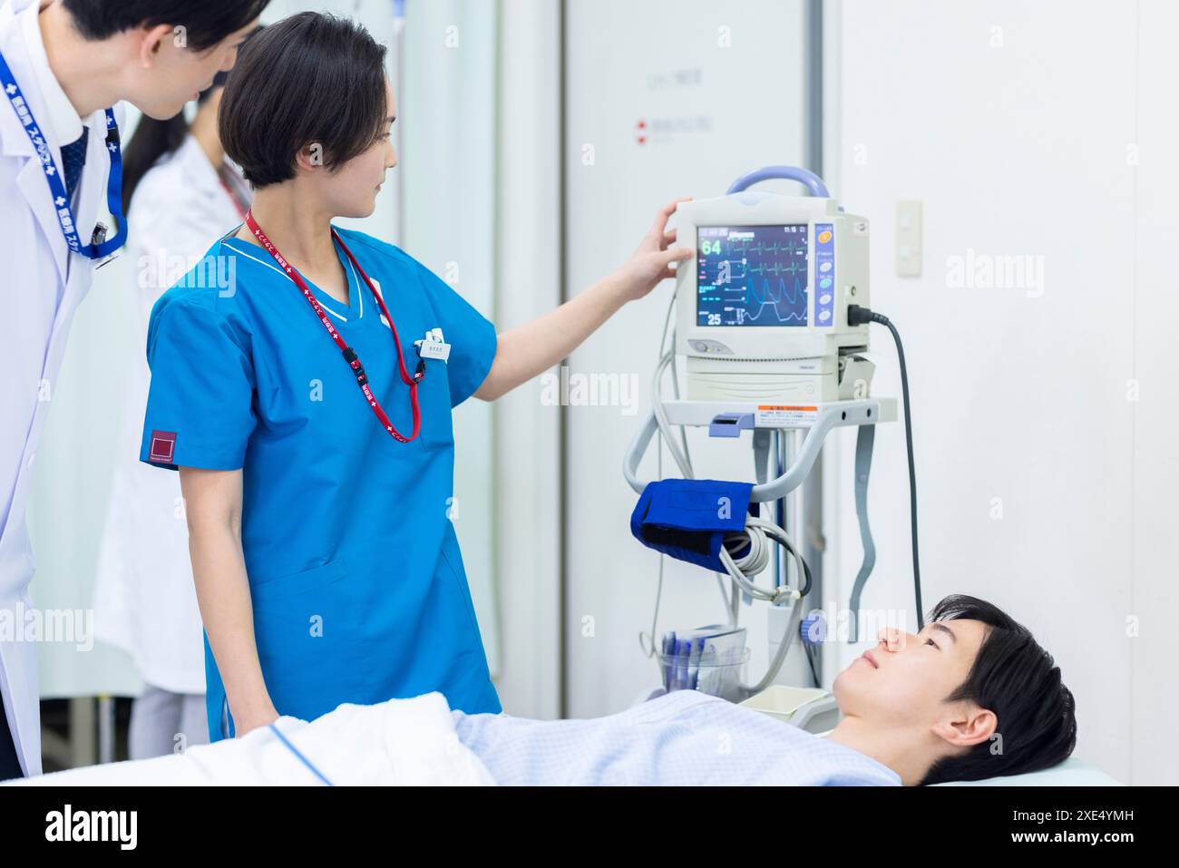 Nurse taking an ECG Stock Photo - Alamy