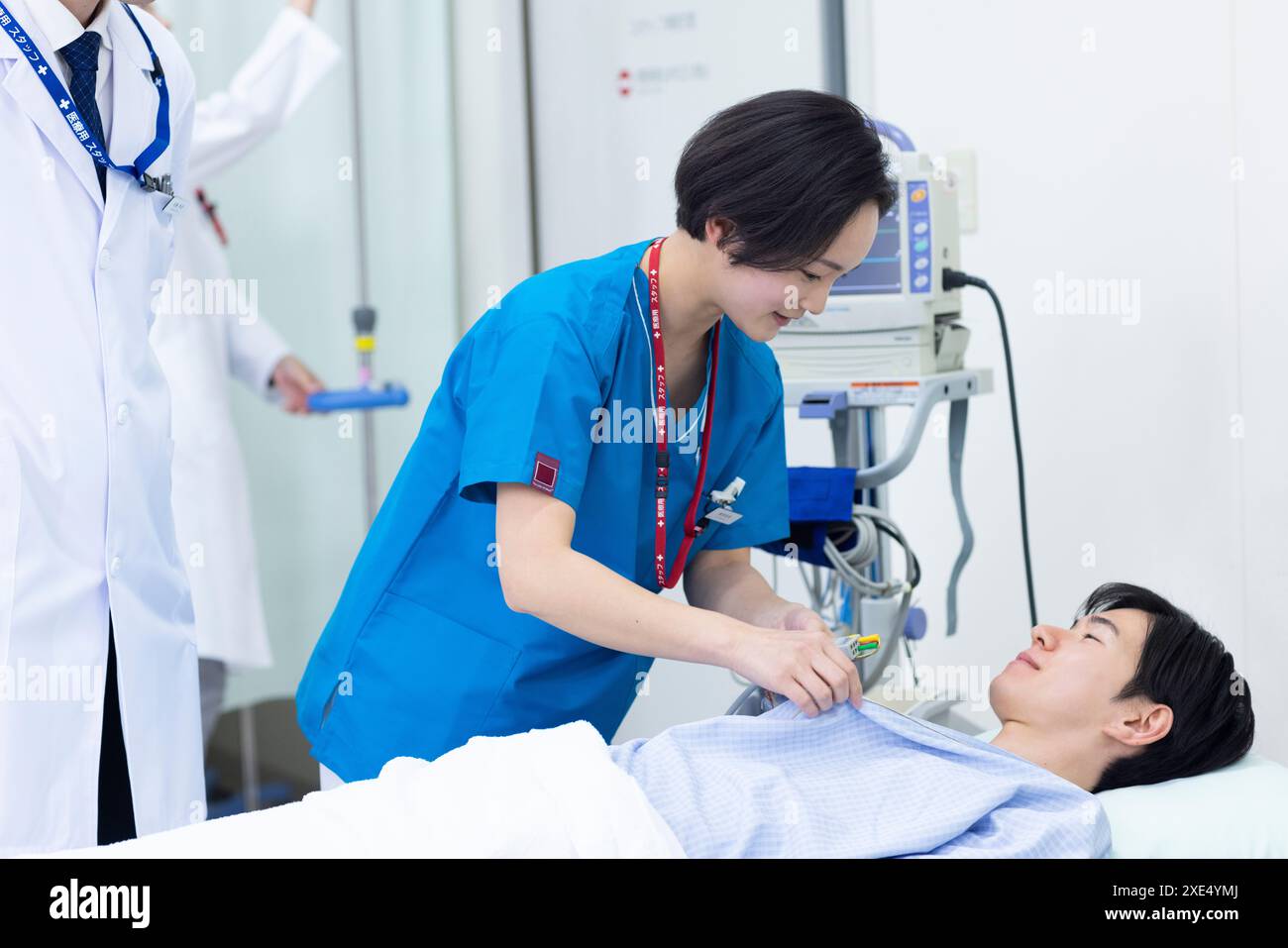 Nurse taking an ECG Stock Photo - Alamy