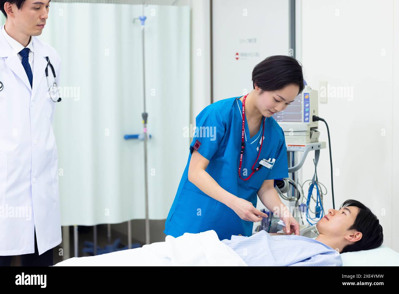 Nurse taking an ECG Stock Photo - Alamy
