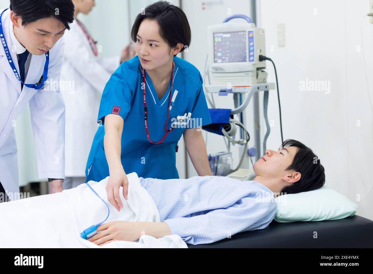 Nurse taking an ECG Stock Photo - Alamy