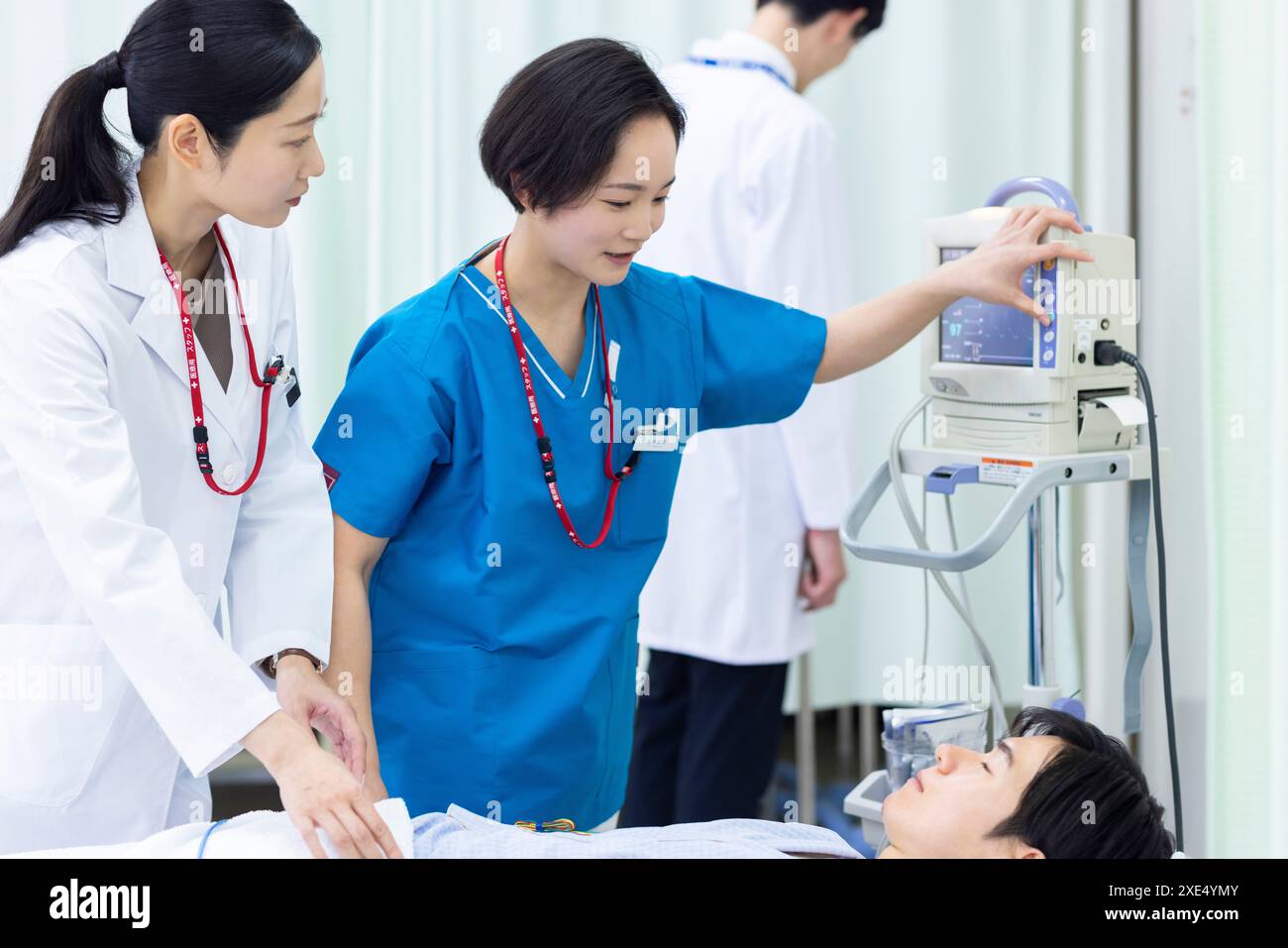 Nurse taking an ECG Stock Photo - Alamy