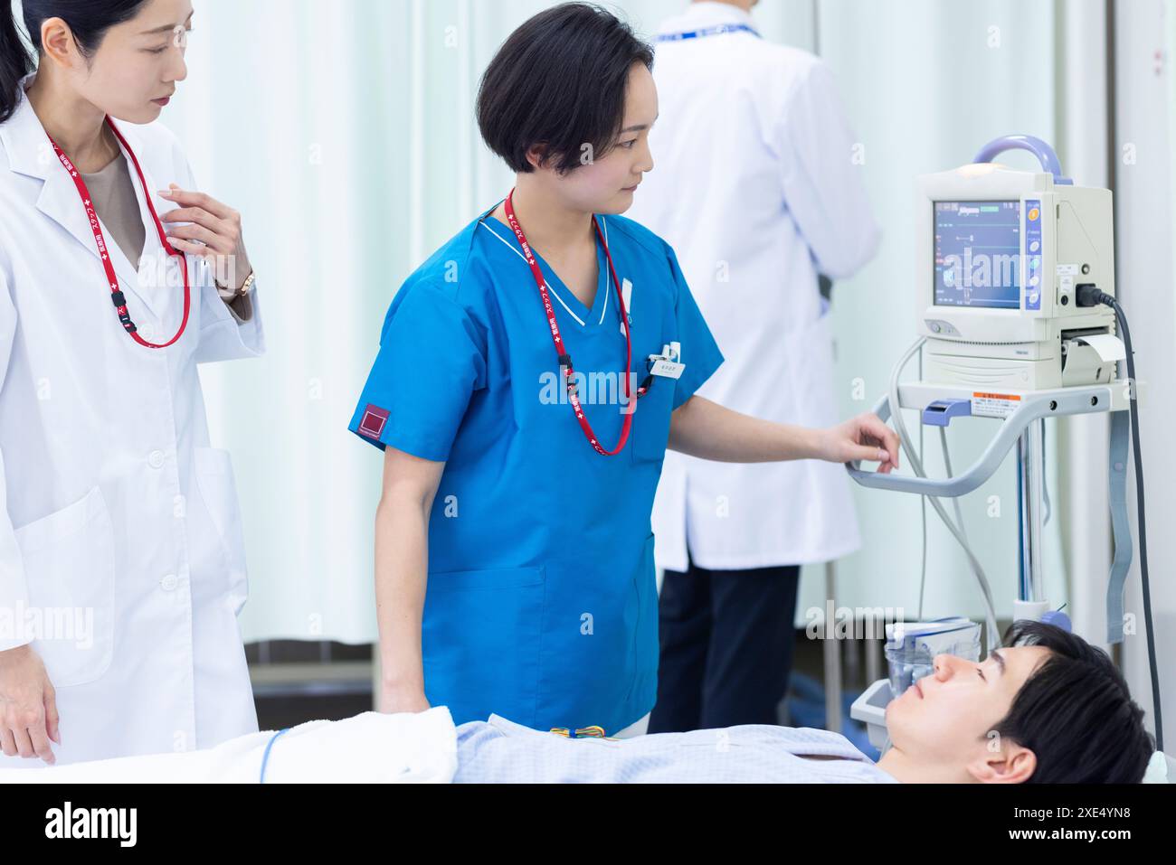 Nurse taking an ECG Stock Photo - Alamy