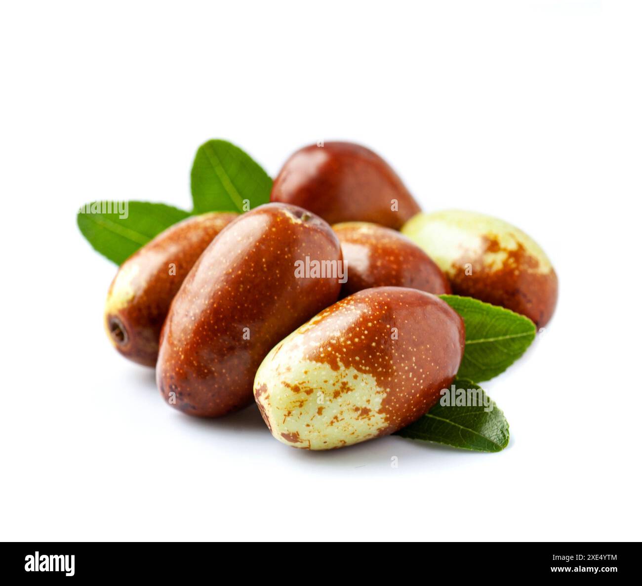 Dates fruits with leaves on white backgrounds Stock Photo - Alamy