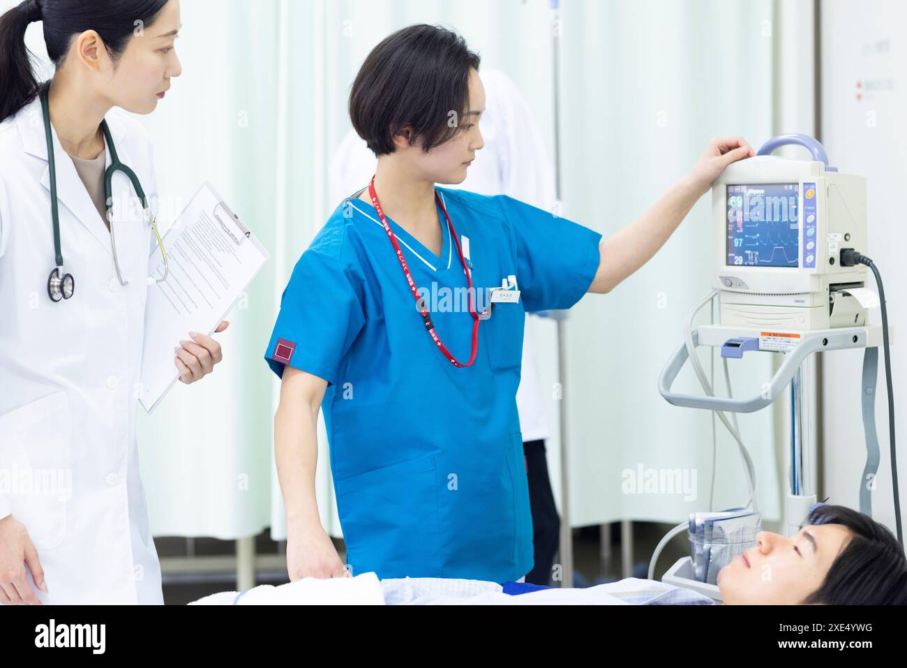 Nurse taking an ECG Stock Photo - Alamy