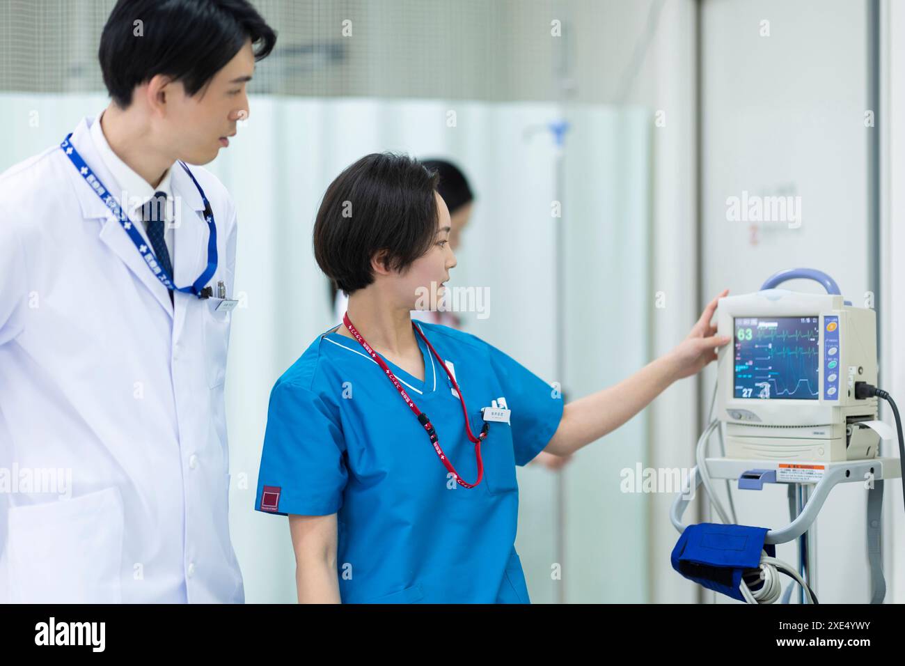 Nurse taking an ECG Stock Photo - Alamy