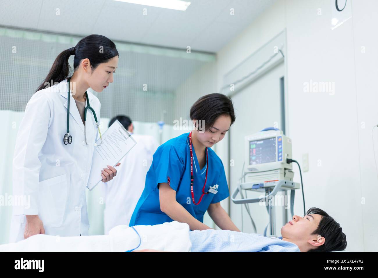 Nurse taking an ECG Stock Photo - Alamy