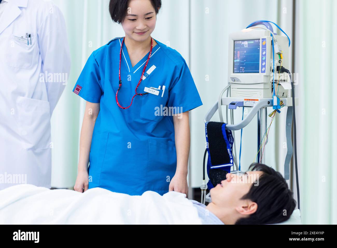 Nurse taking an ECG Stock Photo - Alamy
