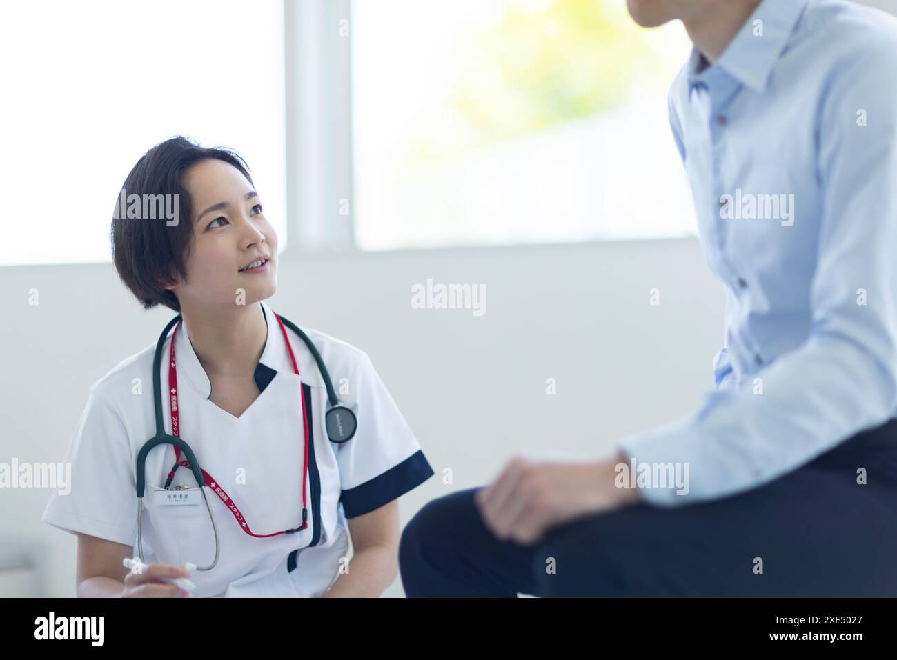 Serious female doctor and patient hi-res stock photography and images ...