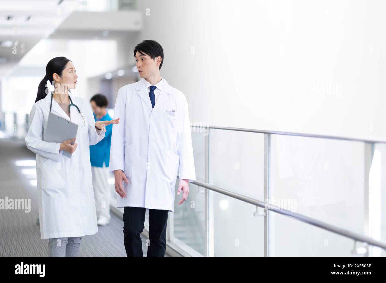 Doctor walking in the hospital Stock Photo - Alamy