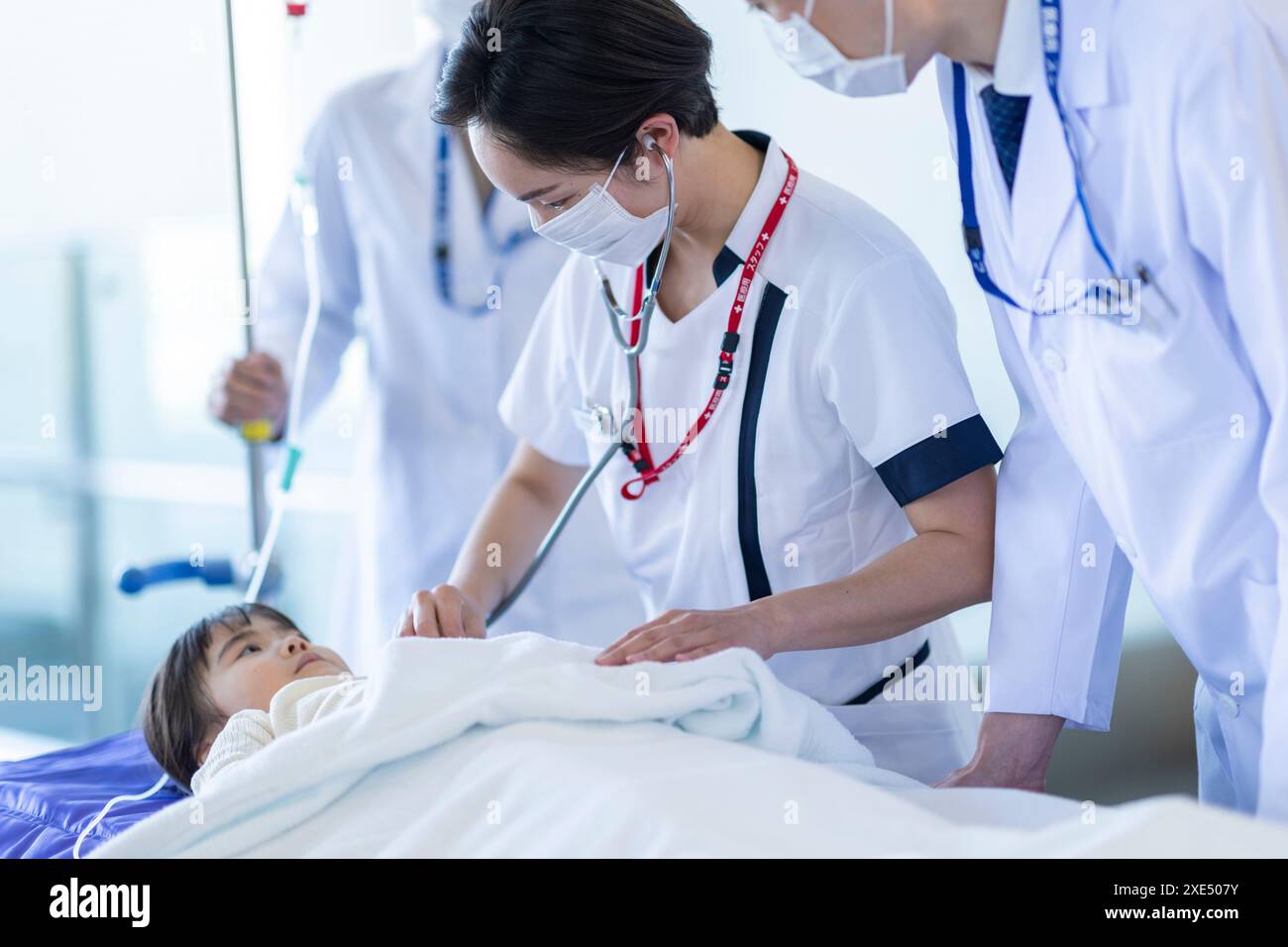 Nurse listening to the sound of her chest Stock Photo - Alamy