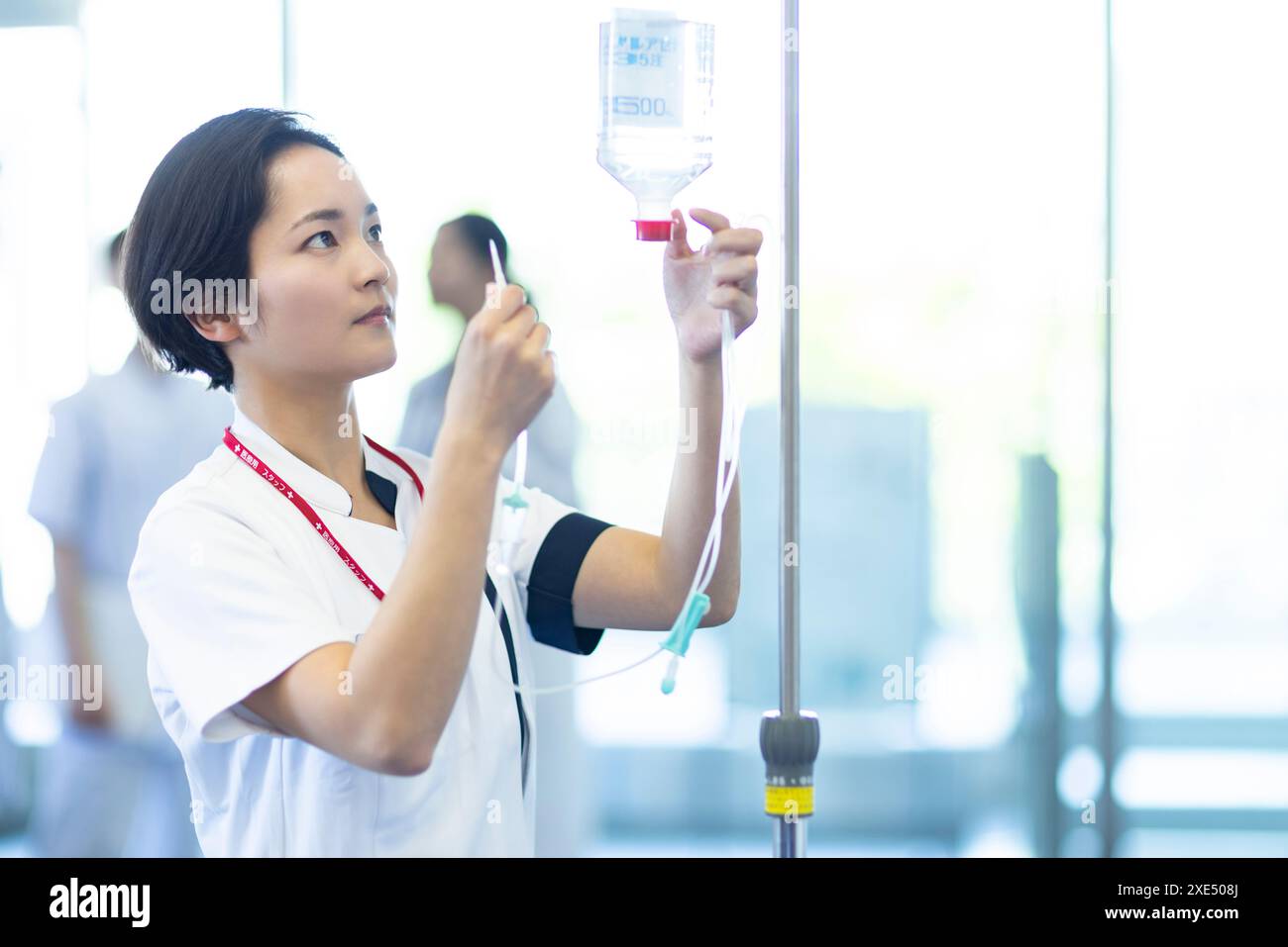 Nurse preparing iv drip hi-res stock photography and images - Alamy