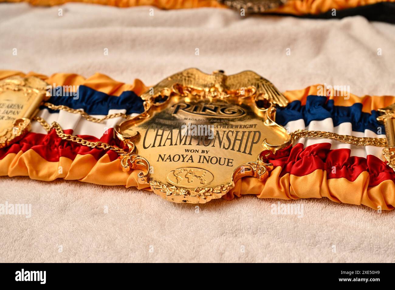 The championship belt prepared for Naoya Inoue of Japan, the undisputed ...